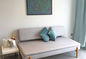 Apartamento standard | Frigobar, cofres nos quartos, cortinas blackout