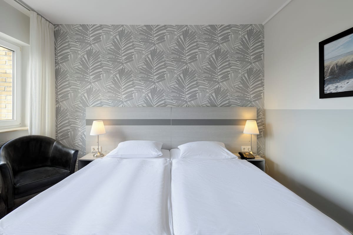 Quarto standard | Camas com colchões pillow-top, ferros/tábuas de passar roupa