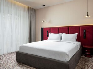 Minibar, cofre no quarto, quartos insonorizados, ferro/tábua de engomar 