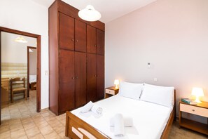 Apartamento, vista para o mar | Ferro/tábua de engomar, camas desdobráveis, Wi-fi grátis 
