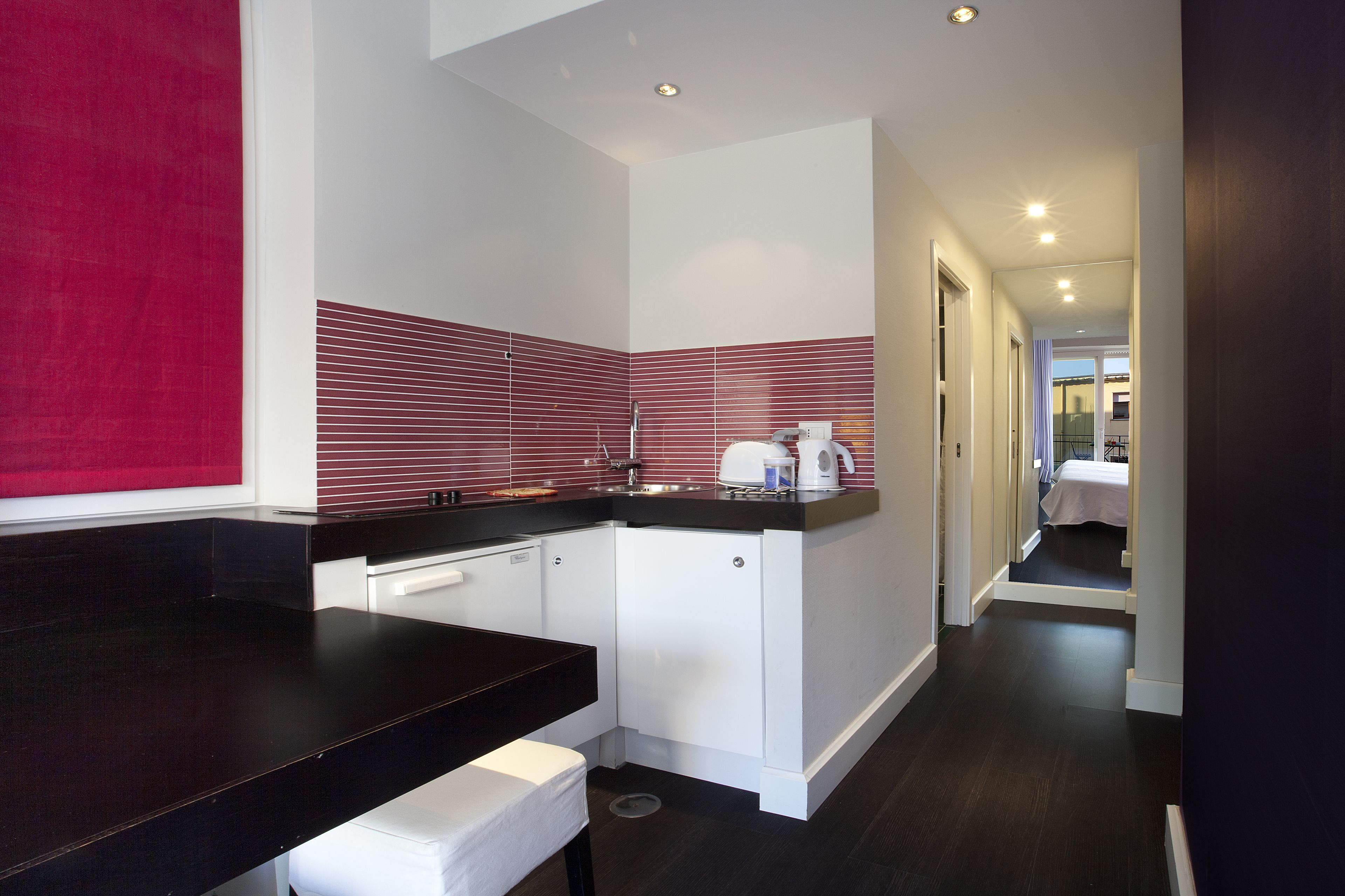 Estúdio Deluxe, varanda | Edredões de penas, secretária, quartos insonorizados 