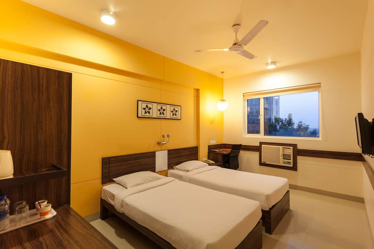 Quarto duplo superior | Frigobar, cofres nos quartos, escrivaninha, Wi-Fi de cortesia