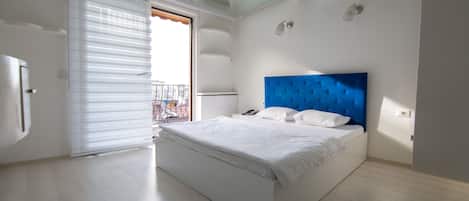 Duplex conforto, terraço | Frigobar, cofres nos quartos, quartos à prova de som