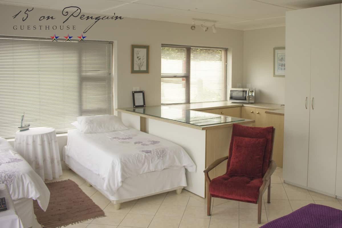 Quarto família, 1 quarto | Cozinha americana privada | Geladeira, cafeteira/chaleira, chaleira elétrica