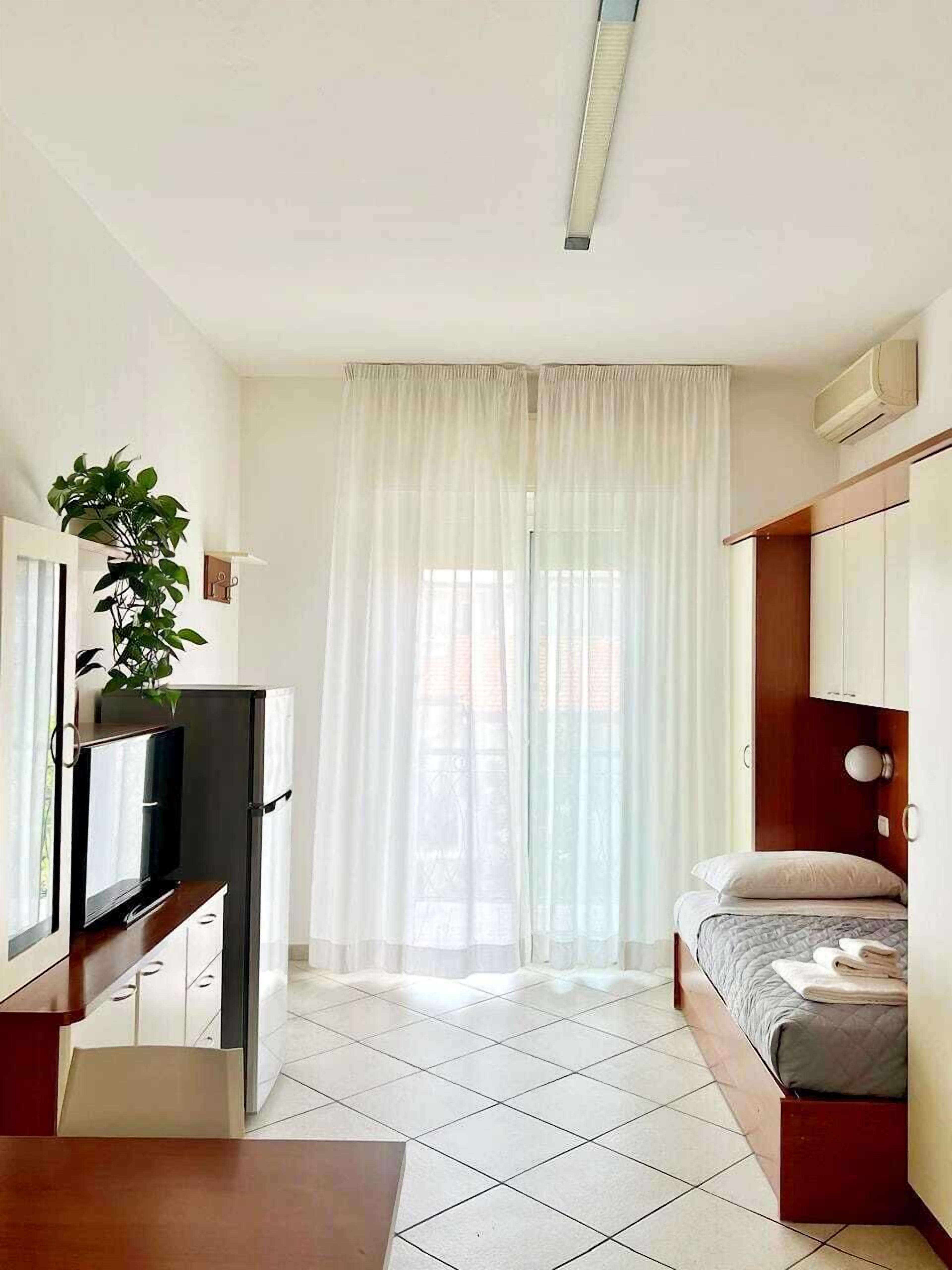 Apartamento, 1 quarto | Cofre no quarto, ferro/tábua de engomar, Wi-fi grátis 