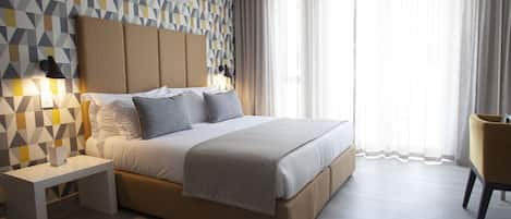 Superior Deluxe Room | Roupas de cama premium, cofres nos quartos, individualmente decorados