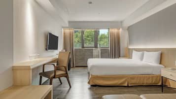 Quarto Duplo Deluxe | Edredões de penas, minibar, secretária, cortinas/cortinados opacos