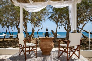 Suite, piscina privativa, vista para o mar | Terraço/pátio interior