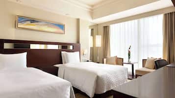 Roupa hipoalergénica, camas de colchão pillowtop, minibar