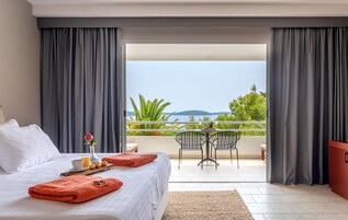 Superior Exclusive Room -Direct Sea View | Roupas de cama premium, camas Select Comfort, frigobar