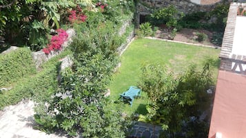 Suíte superluxo, 1 cama Queen | Vista para o jardim
