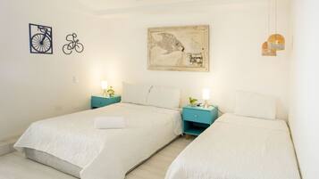 Suíte estúdio família | 1 quarto, cofres nos quartos, Wi-Fi de cortesia, roupa de cama