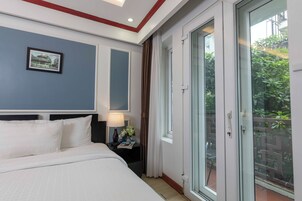 Roupa de alta qualidade, camas de colchão pillowtop, minibar 