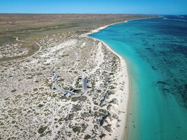 Perto da praia, areia branca 