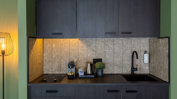 Appartement Familial, vue jardin | Edredões de penas, secretária, ferro/tábua de engomar, Wi-fi grátis