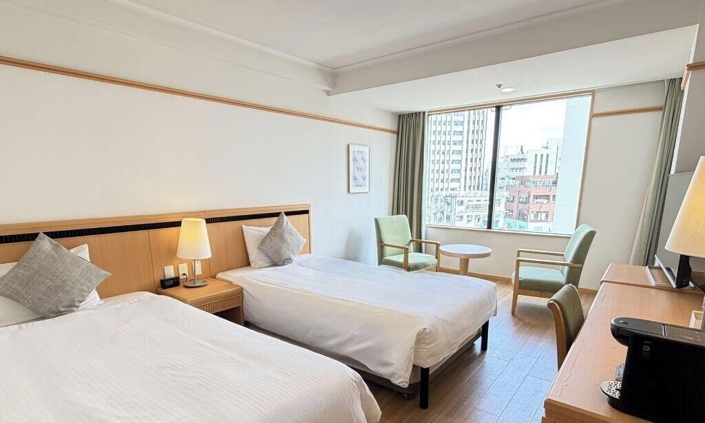 Quarto duplo luxo, para não fumantes | Cortinas blackout, Wi-Fi de cortesia, roupa de cama