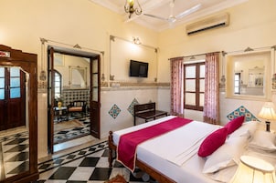 Heritage Suite | Roupas de cama premium, edredons de pluma, frigobar, cofres nos quartos