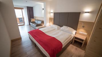 Suite Júnior | Minibar, cofre no quarto, secretária, Wi-fi grátis