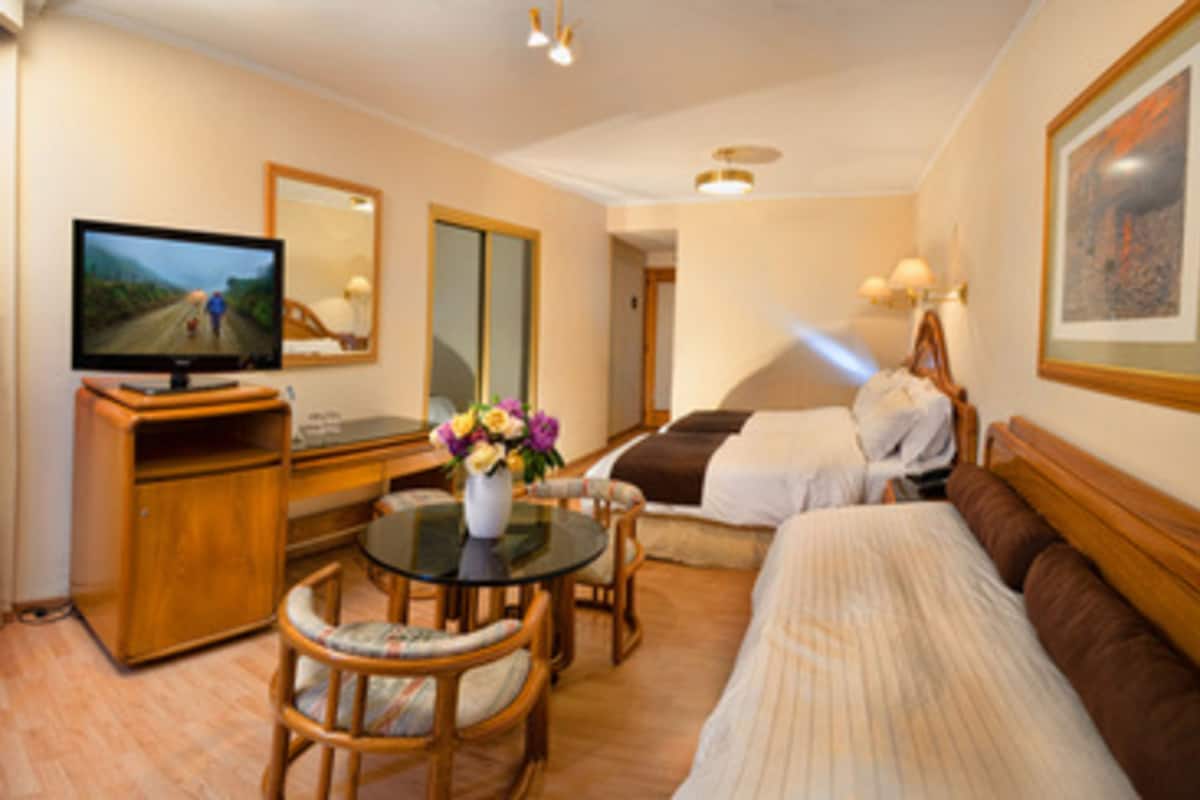 Roupas de cama premium, edredons de pluma, frigobar, cofres nos quartos