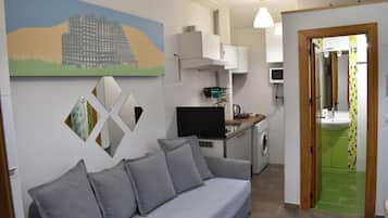 Apartamento, 1 quarto | 1 quarto, roupa de alta qualidade, edredões de penas, cofre no quarto
