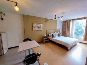 Loft Superior | Roupa de alta qualidade, minibar, cofre com capacidade para portátil 