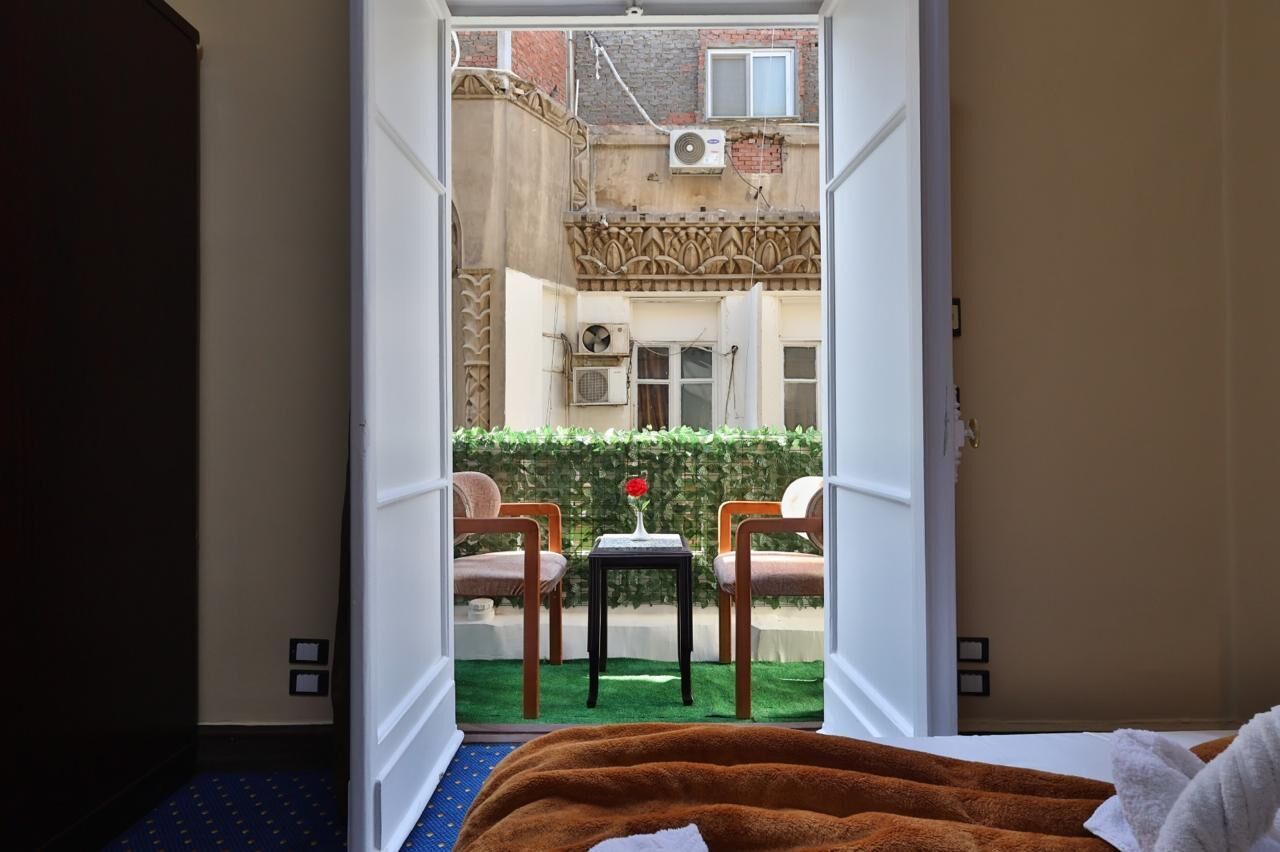 Quarto triplo luxo, 3 camas de solteiro, para não fumantes, vista para a cidade | Terraço/pátio