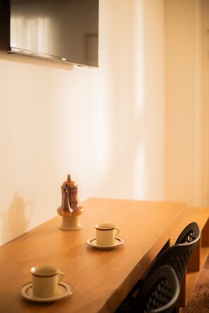 Quarto empresarial (King) | Ferros/tábuas de passar roupa, berços grátis, Wi-Fi de cortesia