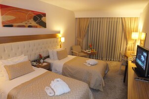 Quarto solteiro | Frigobar, cofres nos quartos, escrivaninha, Wi-Fi de cortesia