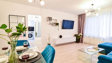 Apartamento de Luxo | Sala de estar | Televisor LED de 140 cm com canais digitais