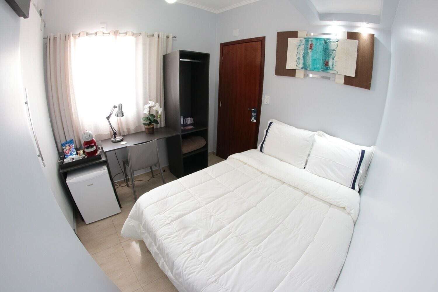 Roupas de cama premium, edredons de pluma, camas com colchões pillow-top