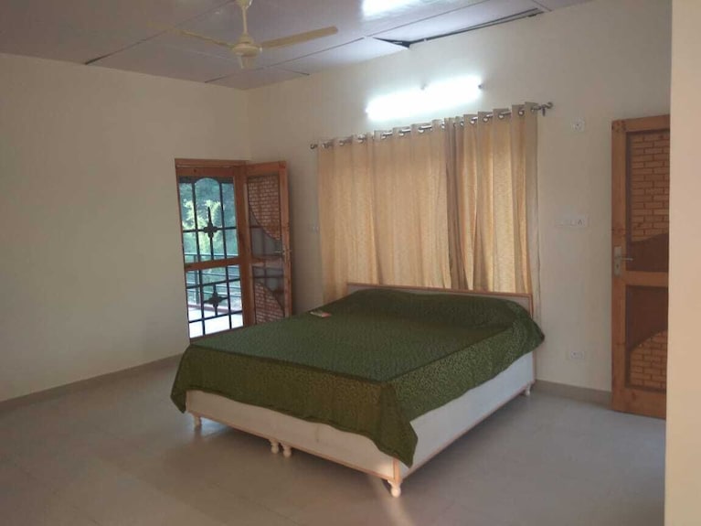 It Is Surrounded By Lush Green Mountains, With Fruit Garden & Vegetable Fields. - Punjab