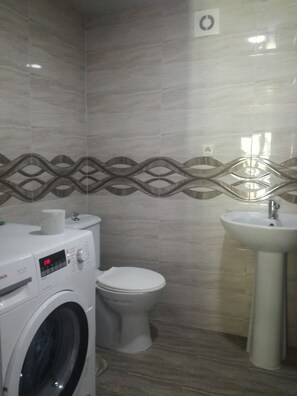 Suite de Luxo | Casa de banho | Artigos de higiene pessoal grátis, um secador de cabelo 