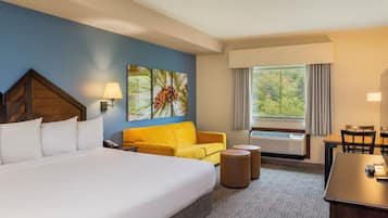 Suite, 1 cama king-size e sofá-cama (King Bunk Suite) | 1 quarto, cofre no quarto, ferro/tábua de engomar, Wi-fi grátis