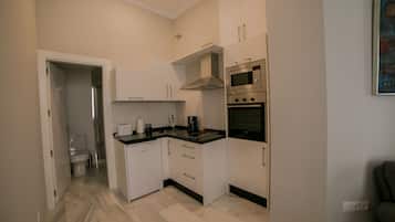 Apartamento, 1 quarto | Cozinha privada | Uma placa de cozinha, Produtos de limpeza