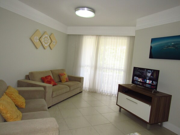 Apartamento, 3 quartos | Sala de estar