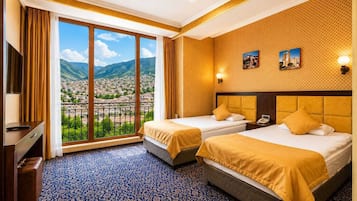 Quarto Twin Standard | Minibar, cofre no quarto, quartos insonorizados, ferro/tábua de engomar