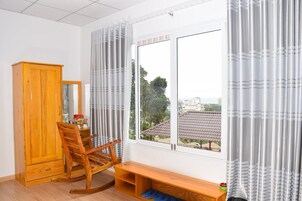 Quarto Quádruplo Clássico | Vista para a praia ou o mar