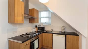 Apartamento, banheiro privativo | Cozinha compartilhada