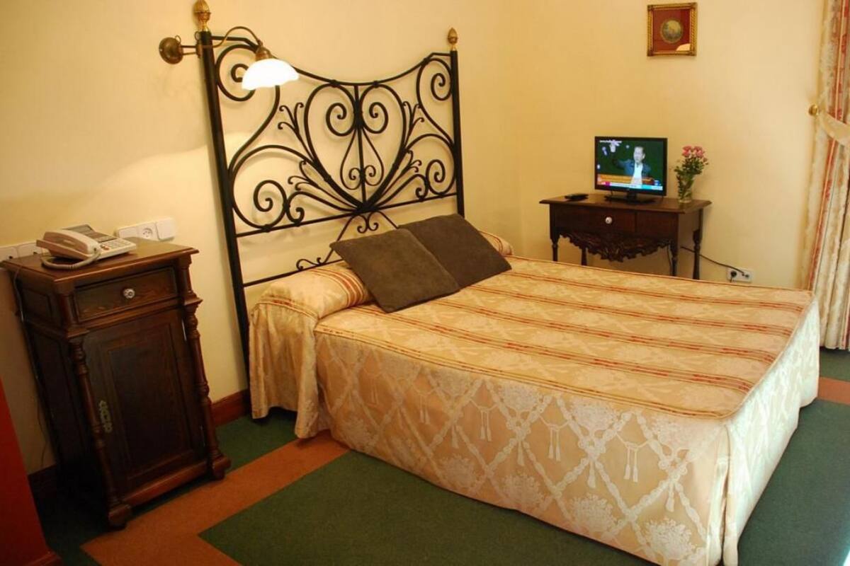 Quarto Individual | Minibar, cofre no quarto, quartos insonorizados