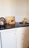 Apartamento, 1 quarto | Café e/ou cafeteira
