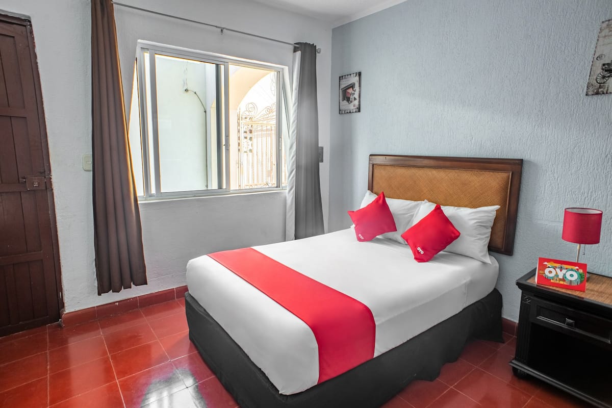 Quarto standard | Ferros/tábuas de passar roupa, Wi-Fi de cortesia, roupa de cama