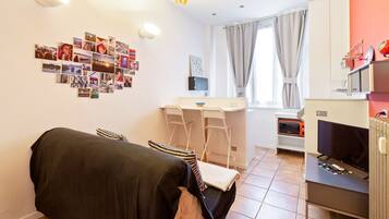 Apartamento, 1 quarto, para não fumantes | Área de estar | TV de tela plana