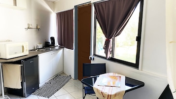 Estúdio, 1 cama king-size, kitchenette, vista para o jardim (Totem)