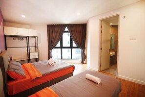 Apartamento, 2 quartos | Individualmente mobiliados, ferros/tábuas de passar roupa