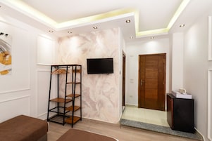 Quarto Triplo | Minibar, cortinas/cortinados opacos, quartos insonorizados