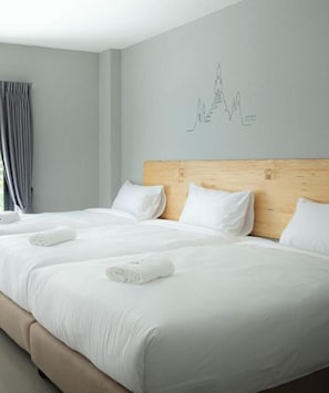 Roupas de cama premium, escrivaninha, Wi-Fi de cortesia