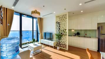 Apartamento empresarial, 2 quartos | Área de estar | Smart TV