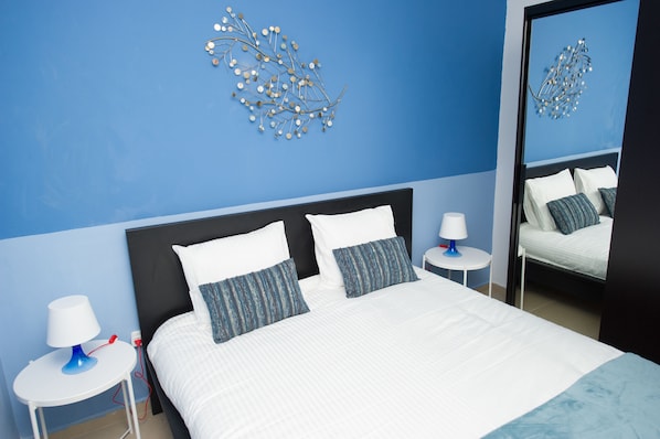Apartamento Comfort | 2 quartos, cortinas/cortinados opacos, ferro/tábua de engomar