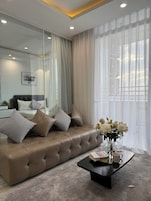 Apartamento, 2 quartos, vista para o mar | Sala de estar | TV de ecrã plano 