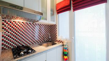 Quarto | Cozinha privada | Geladeira, cooktop, chaleira elétrica